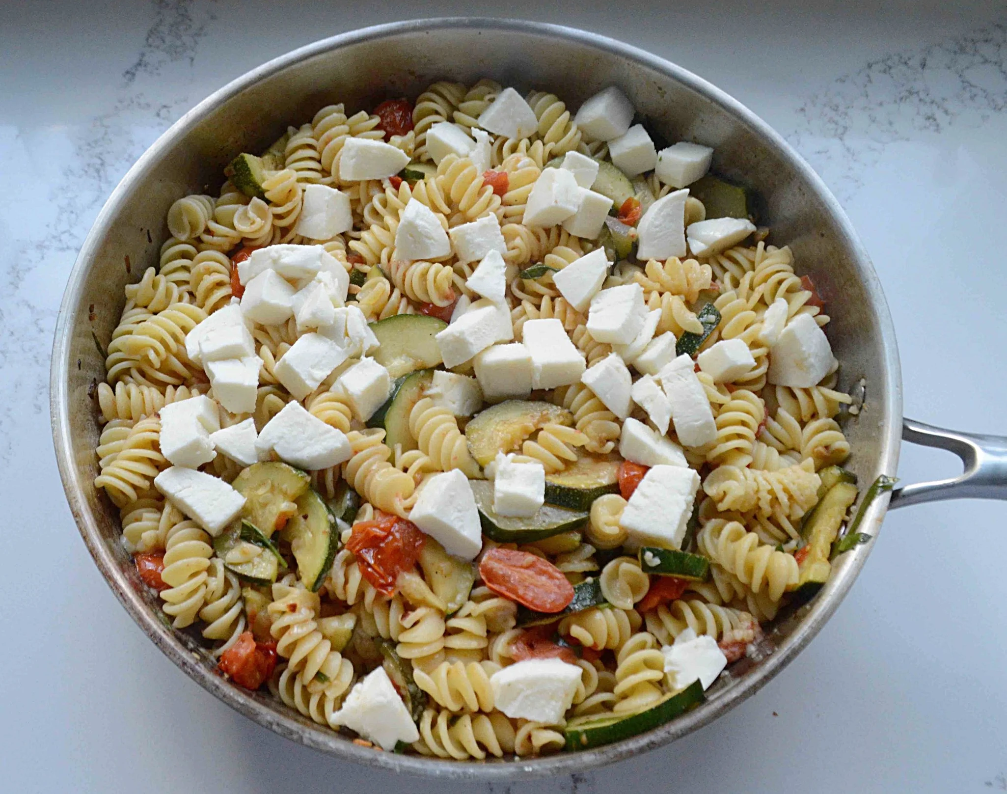 Back Pocket Pasta's Tomato & Zucchini Melt-Famous Fridays — Unwritten ...