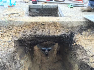 FORCED SEWER MAIN — APEX DIRECTIONAL DRILLING