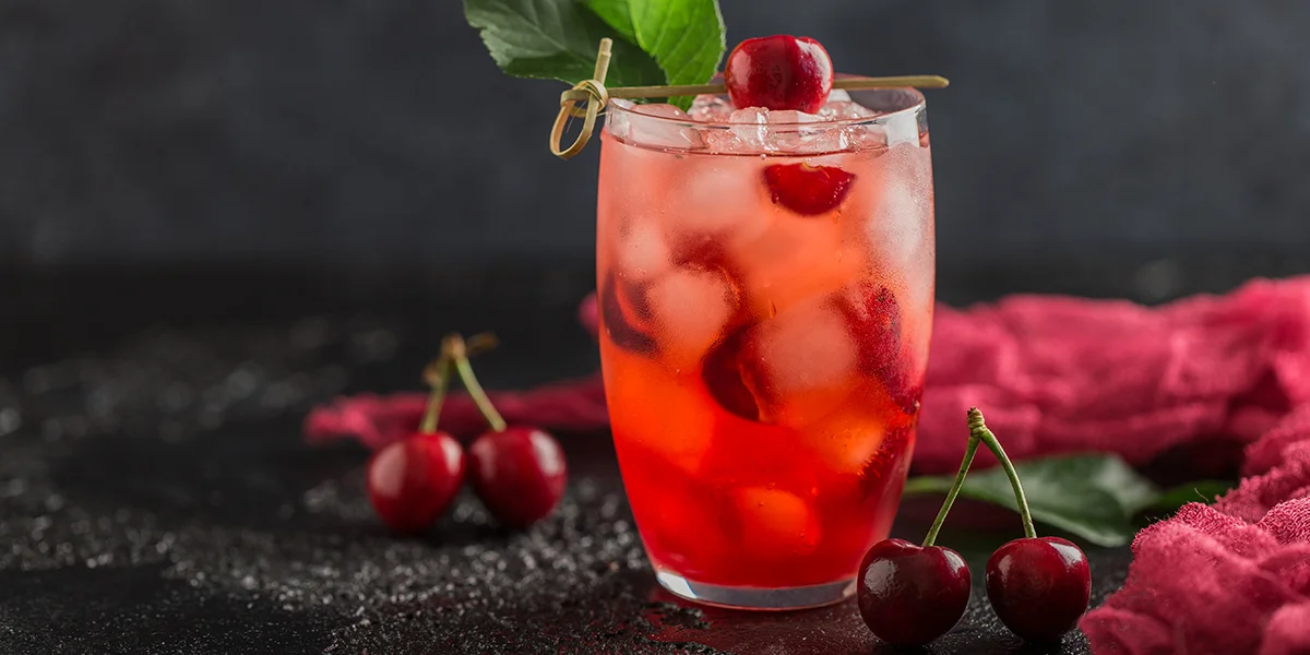 Try this fresh cherry gin and tonic for a summery twist on your usual G ...