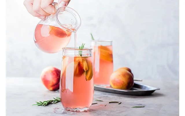 Pink gin and peach lemonade really is a winning summer combination ...