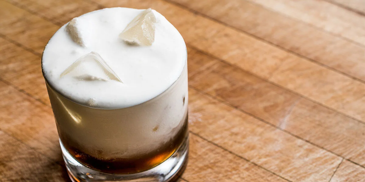 This creamy coffee cocktail is a delicious gin-spiked take on the White ...