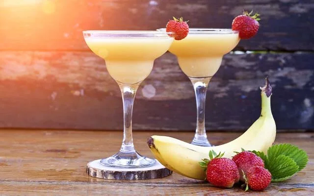 A creamy Banana Colada cocktail will bring the Brazilian beach to your ...