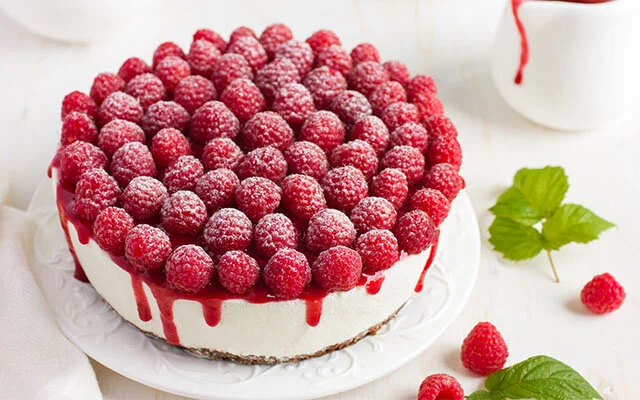 Our boozy Raspberry Gin Cheesecake is the summer dessert of our dreams ...