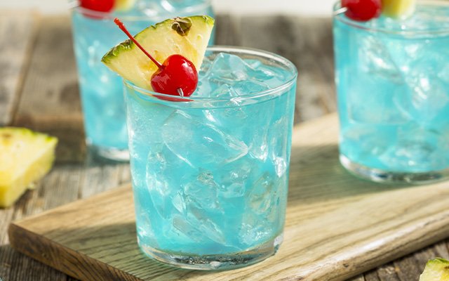 Gin and Blue Curaçao come together in this gorgeous blue cocktail ...