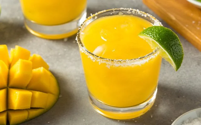 Every sip of this mango, ginger and gin cocktail is brimming with ...