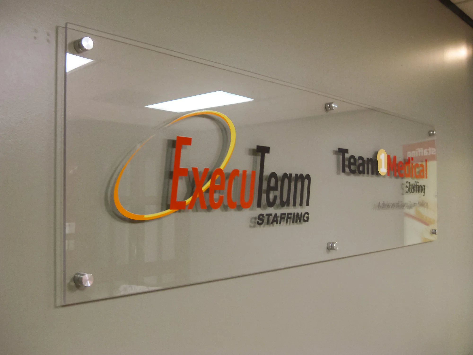 Backplated Logo Signs | Saifee Signs, Houston TX