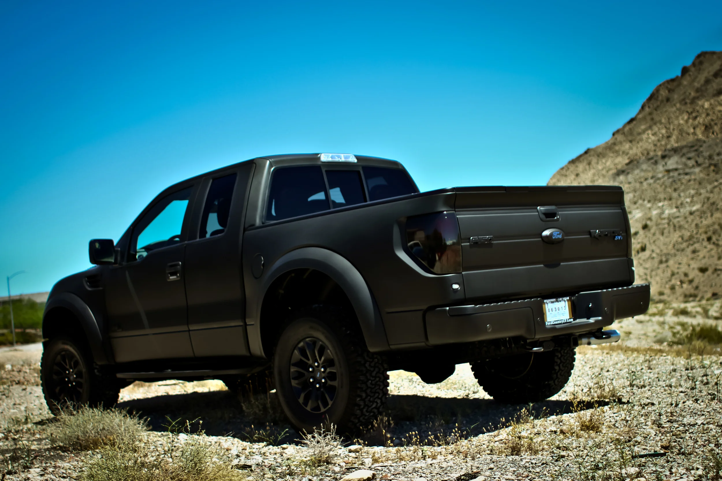 Ford Raptor - Matte Black with Blue Accents — Incognito Wraps