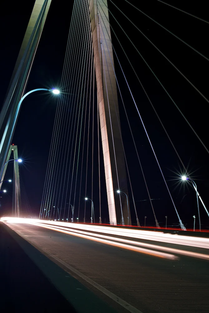 Looking Down From A Bridge At Night