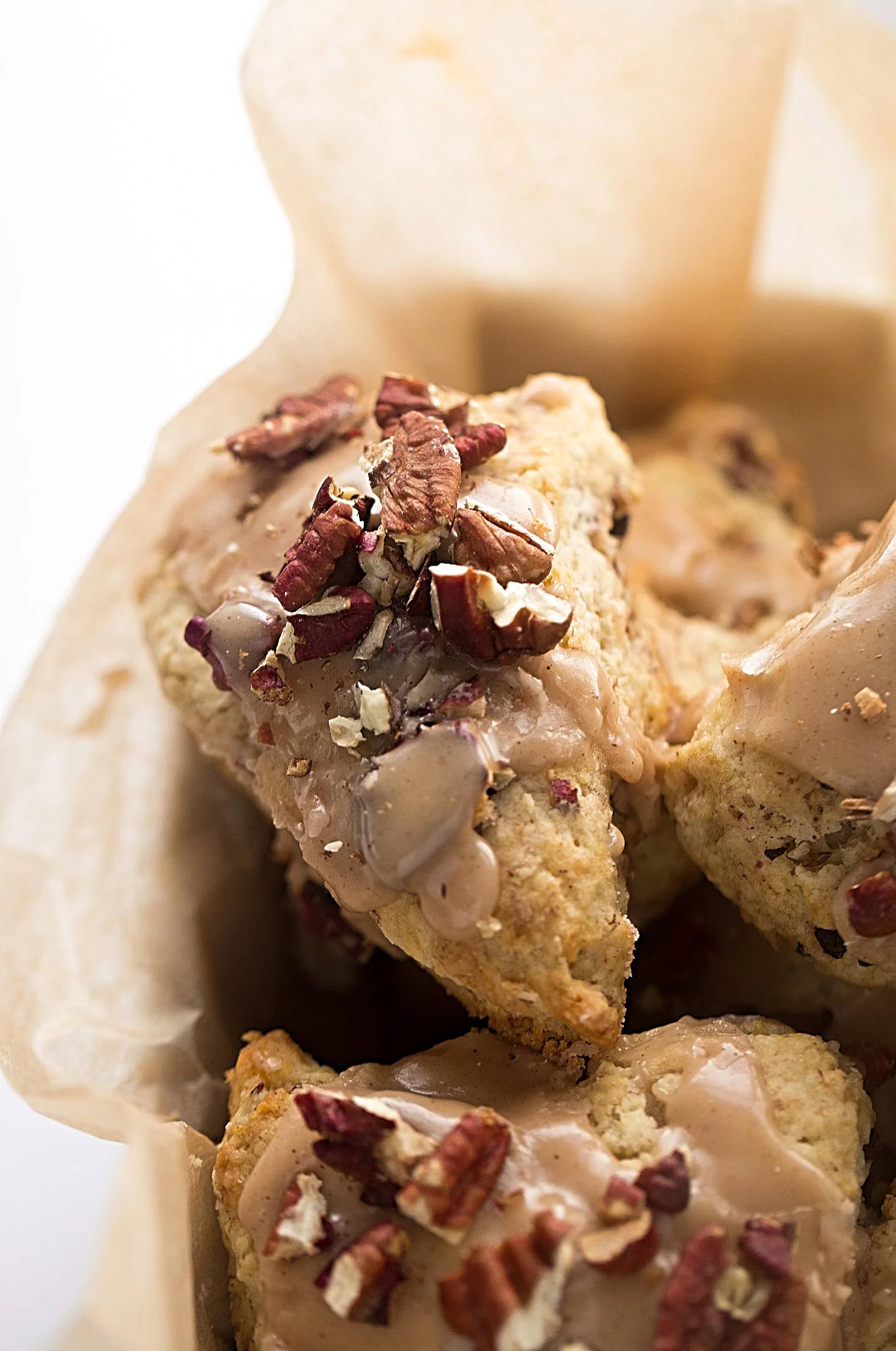 Maple Glazed Cinnamon Pecan Scones | Truffles and Trends
