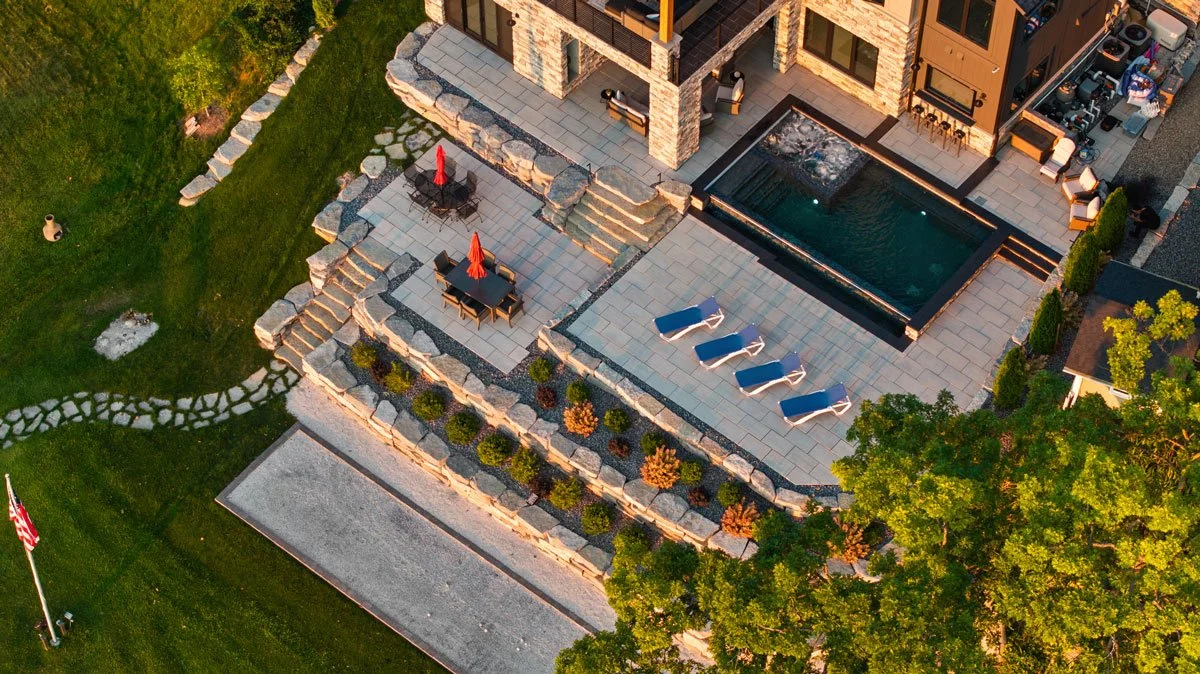 A Luxury Lakefront Retreat with Infinity Pool & Outdoor Living — VENTURES