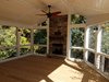 Screened Porch with Fireplace and Wall Sconces