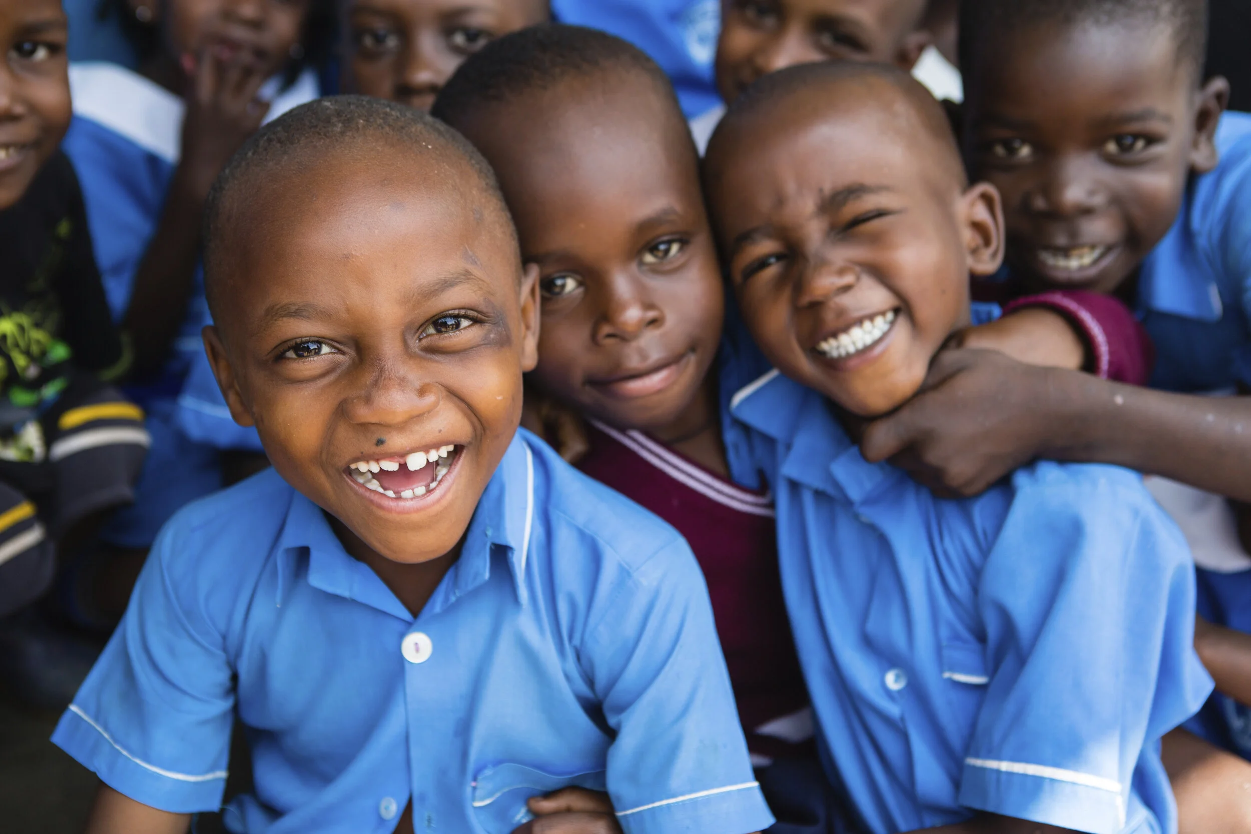 Programs — ACTION IN AFRICA