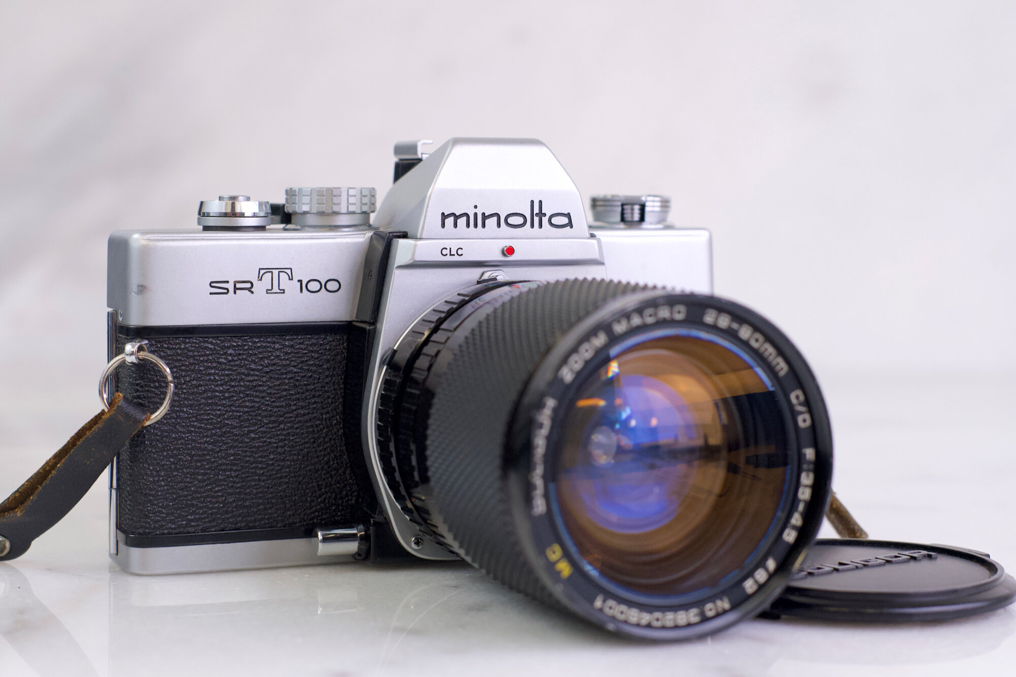 Minolta SRT 100 35mm Film Camera with 28-80mm Zoom Lens, Lens Cap and ...