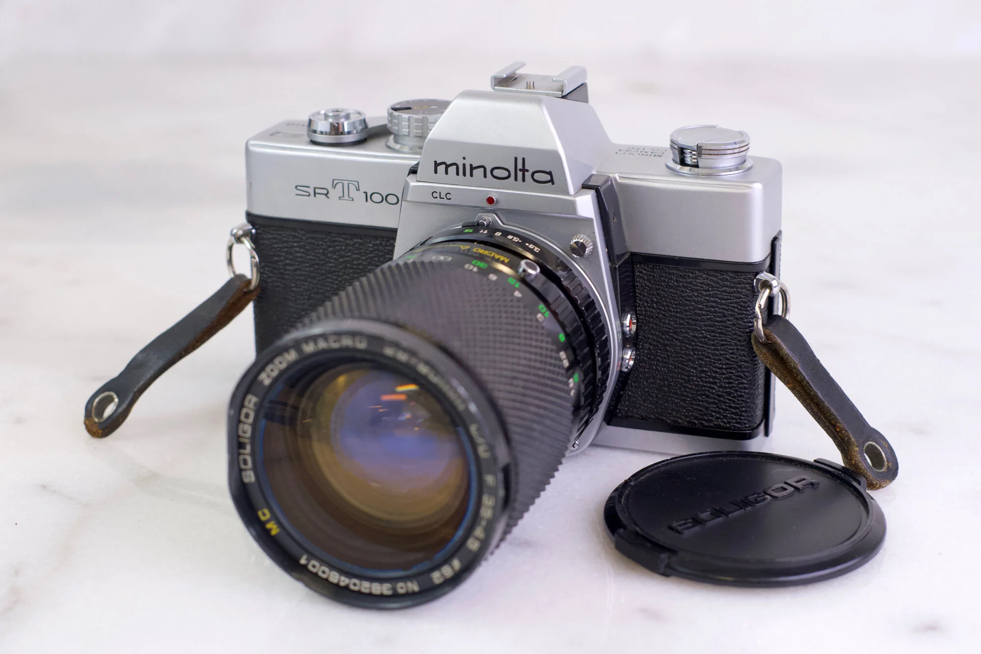 Minolta SRT 100 35mm Film Camera with 28-80mm Zoom Lens, Lens Cap and ...