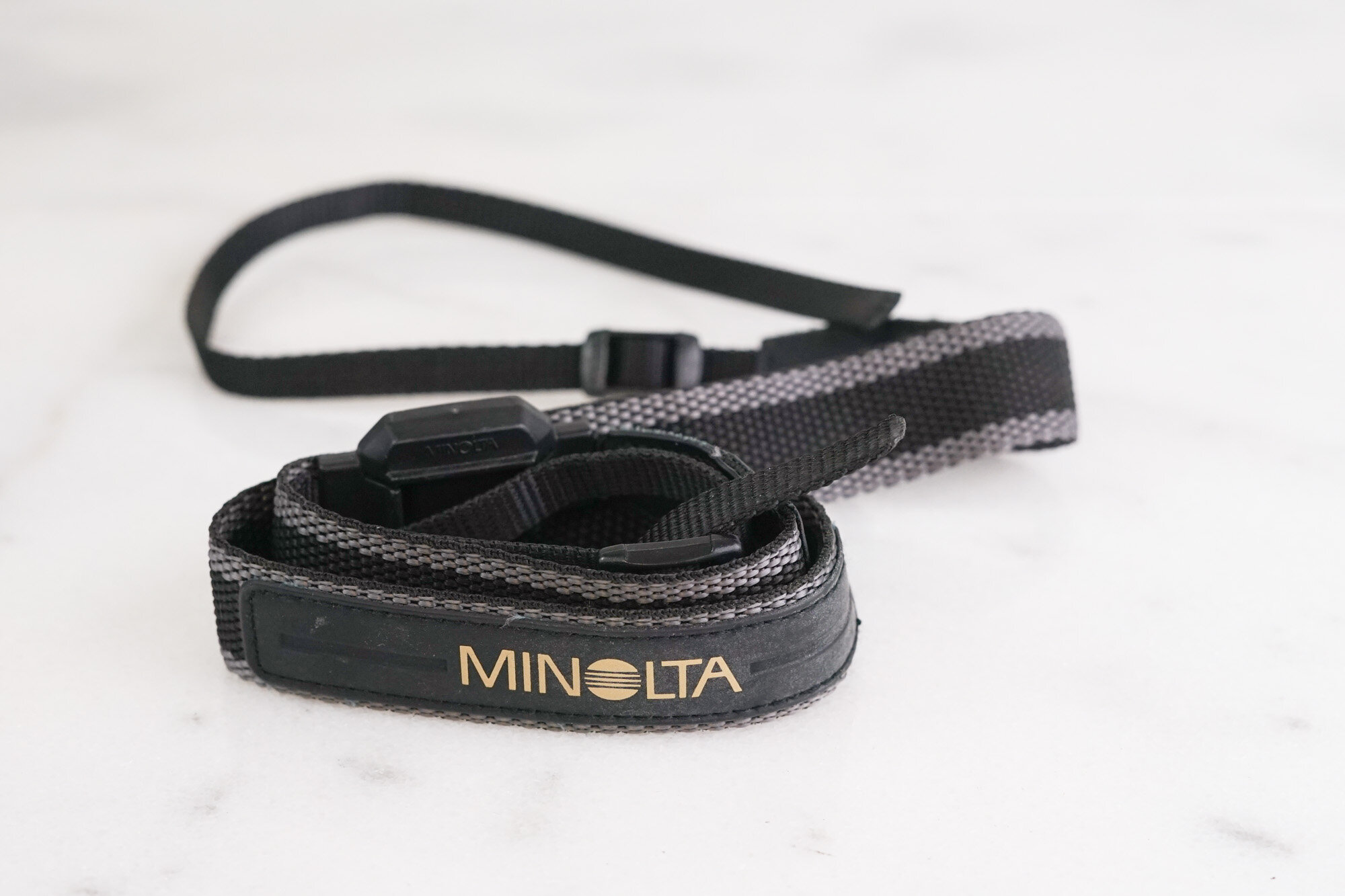 Minolta Camera Strap in Black, Grey, and Gold, with Viewfinder Cover ...