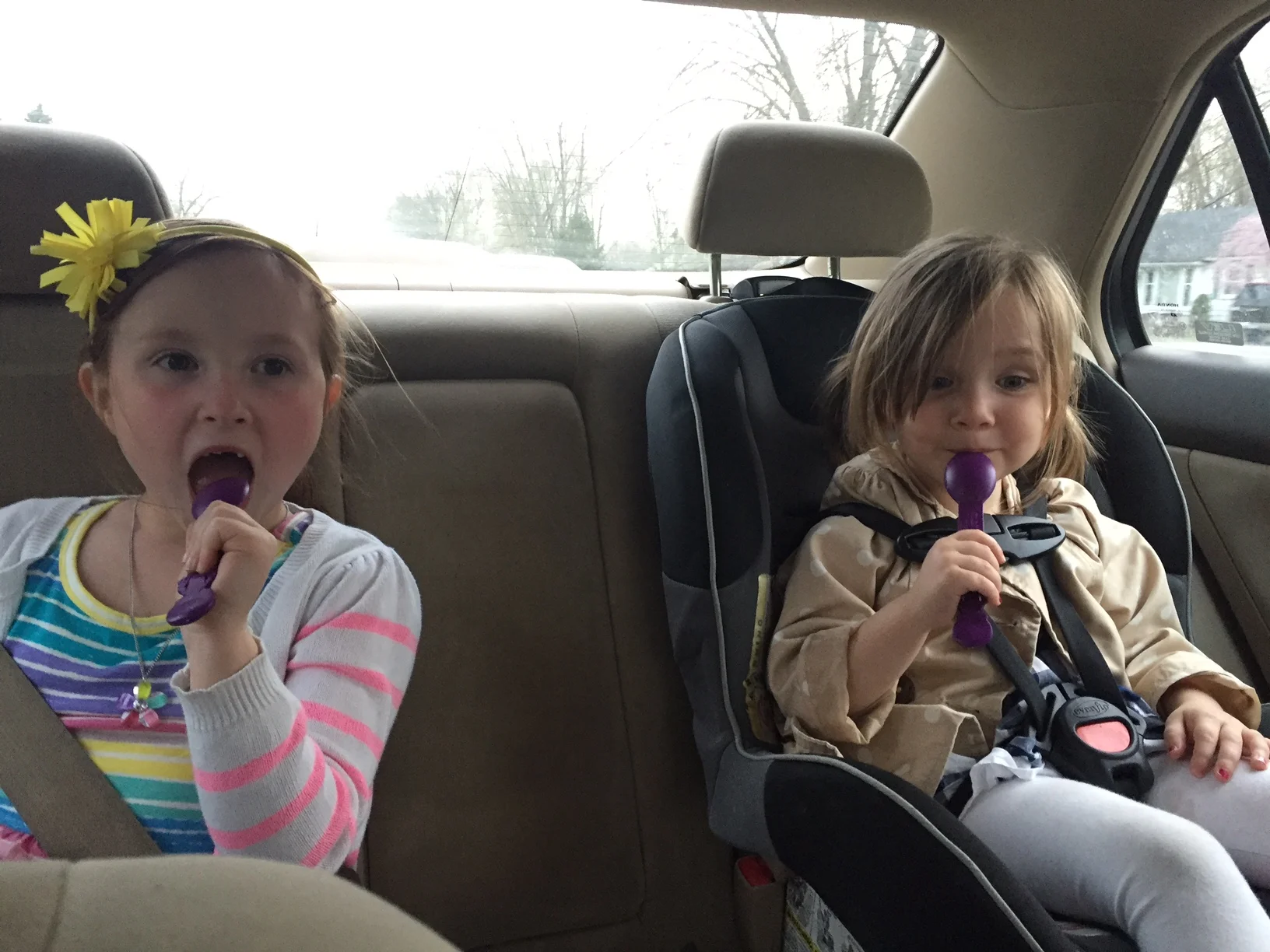 Annoyed Girl In Car Seat