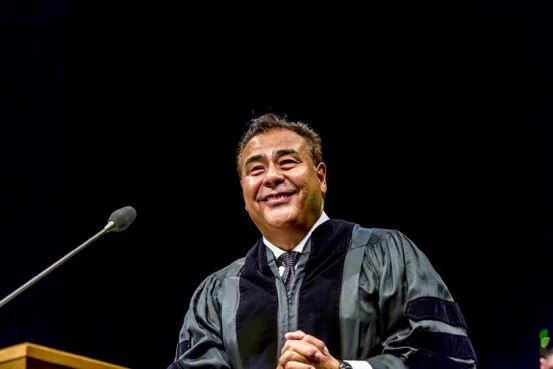 About — John Quiñones