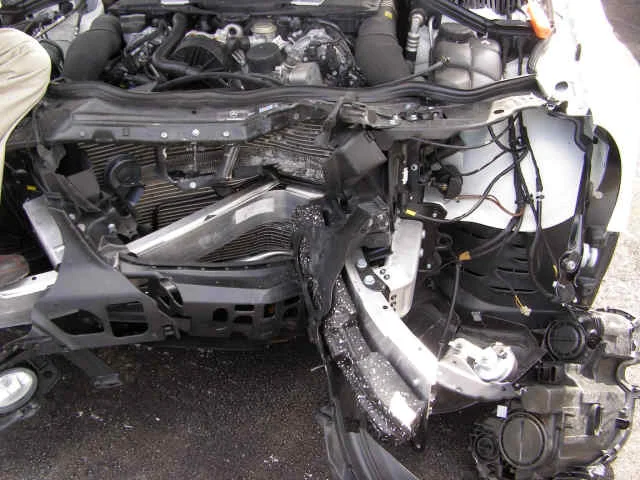 Mercedes E350 front end damage — State Auto Body Inc.