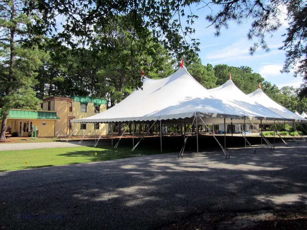 What is the difference between a frame tent and a pole tent?