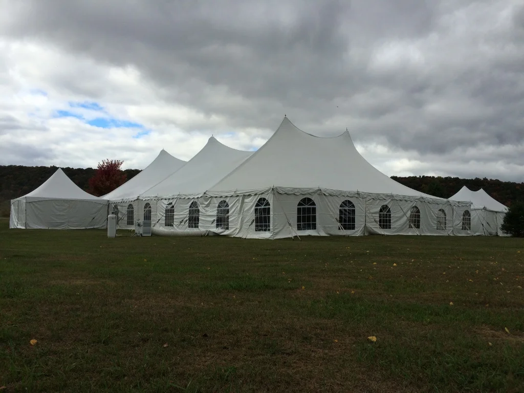 What is the difference between a frame tent and a pole tent?