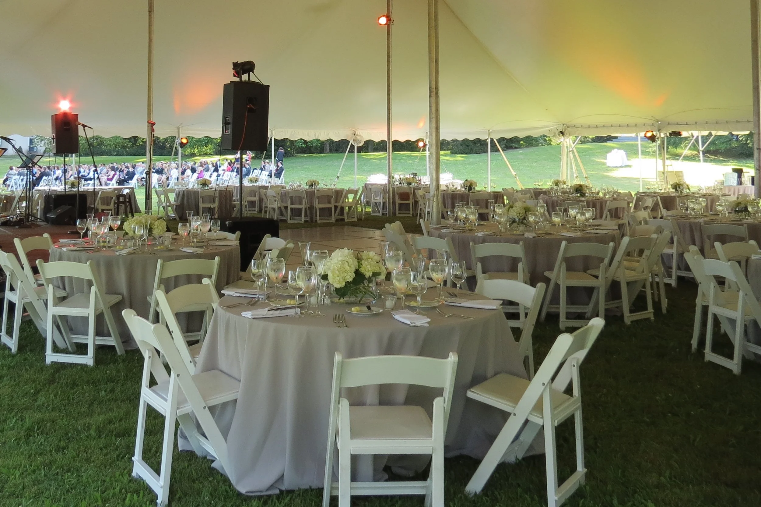 Should I Choose Round or Long Tables for my Outdoor Tent Event?