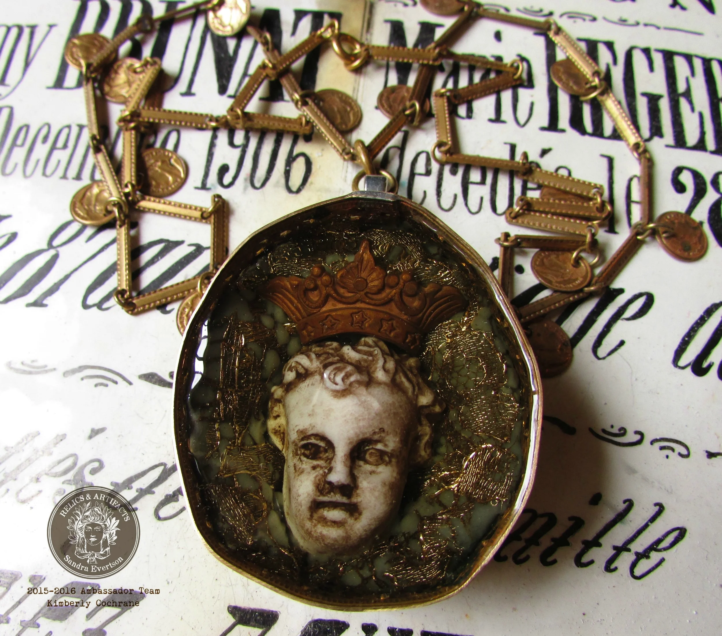 A Crowned Cherub Relic Pendant with RELICS & ARTIFACTS® Ambassador ...