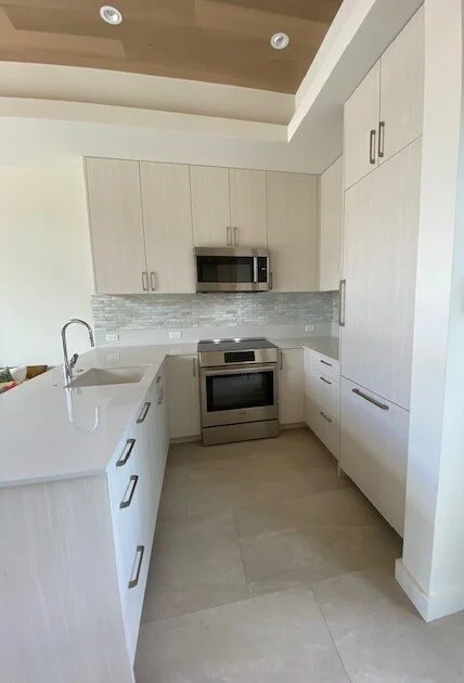 A gallery of various spaces showcasing cabinets and countertops ...