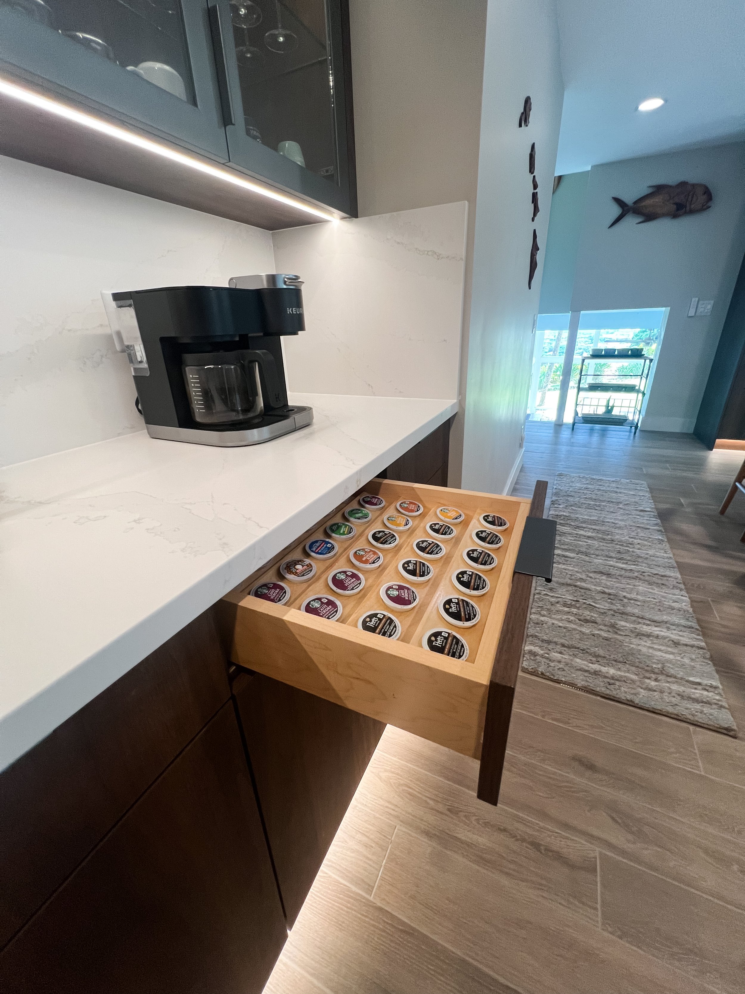 A gallery of various spaces showcasing cabinets and countertops ...