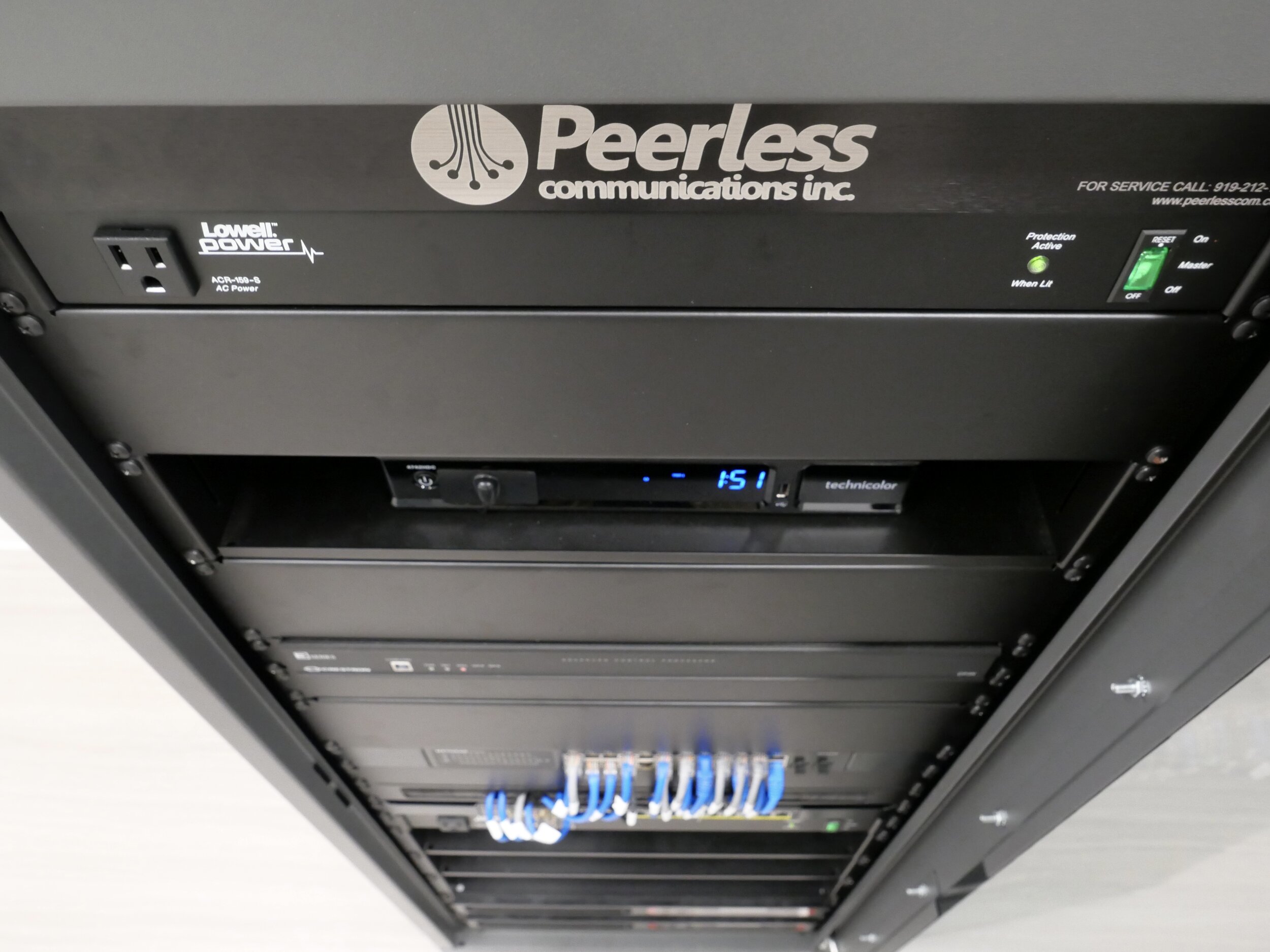 Young Moore — Peerless Communications inc.