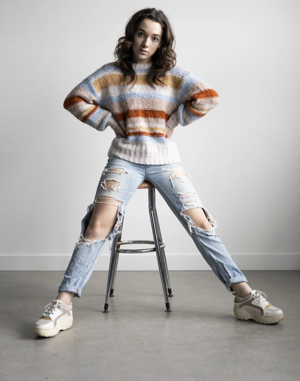 A Rising Star Turns a New Page — Raine Magazine