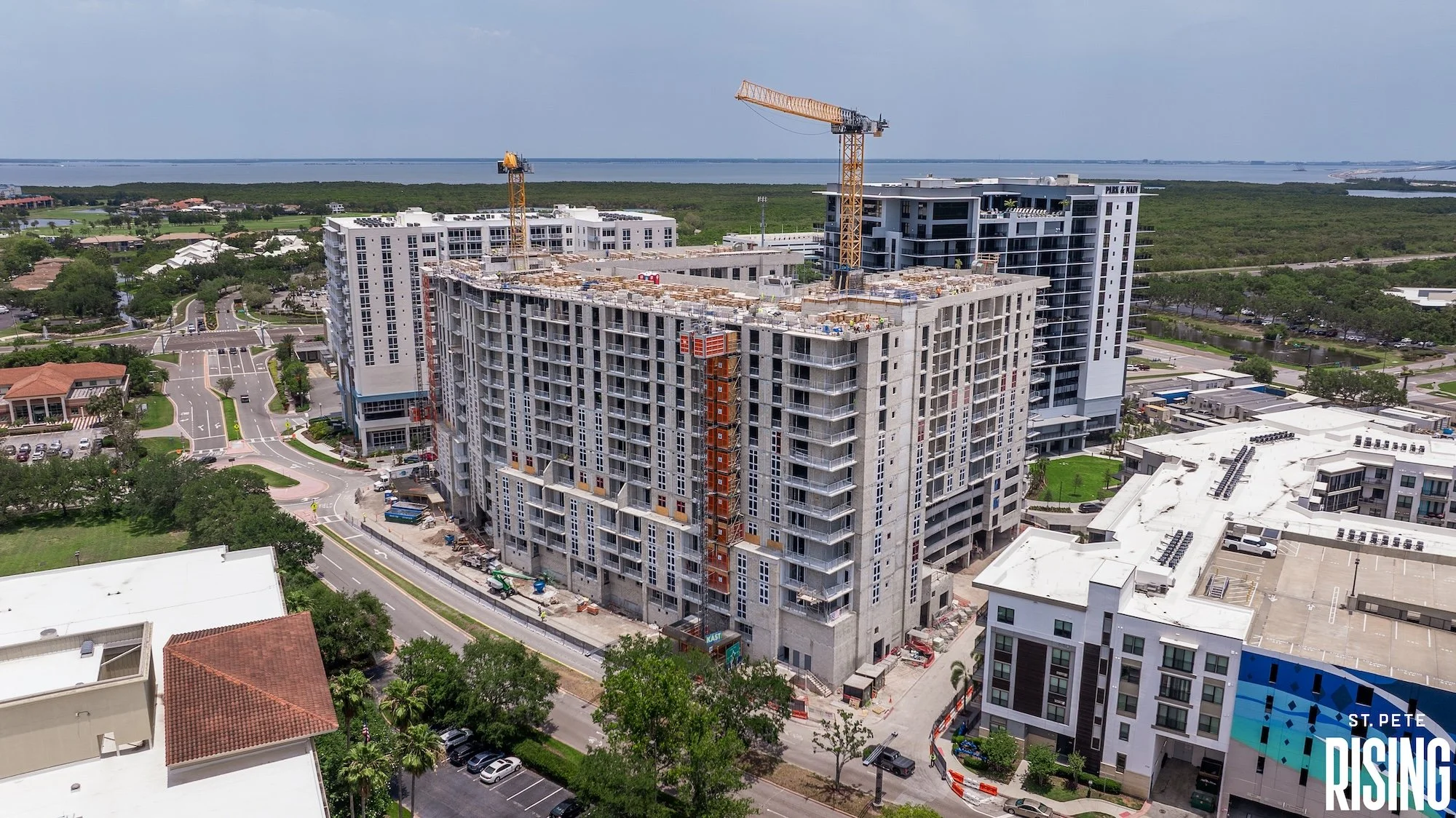 14-story luxury apartment tower tops out at Echelon City Center in ...