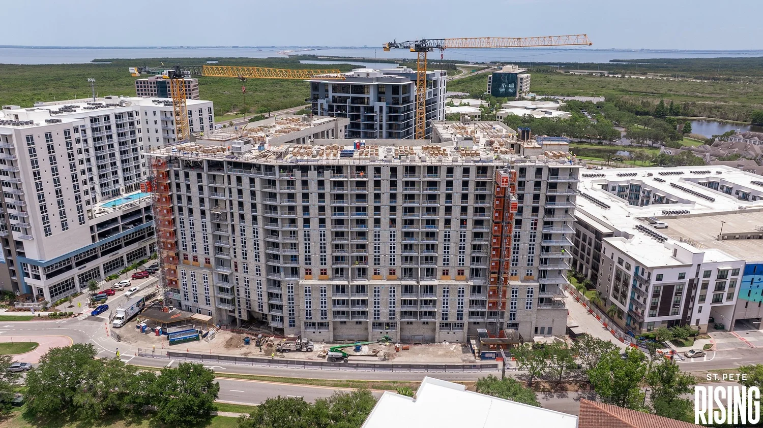 14-story luxury apartment tower tops out at Echelon City Center in ...