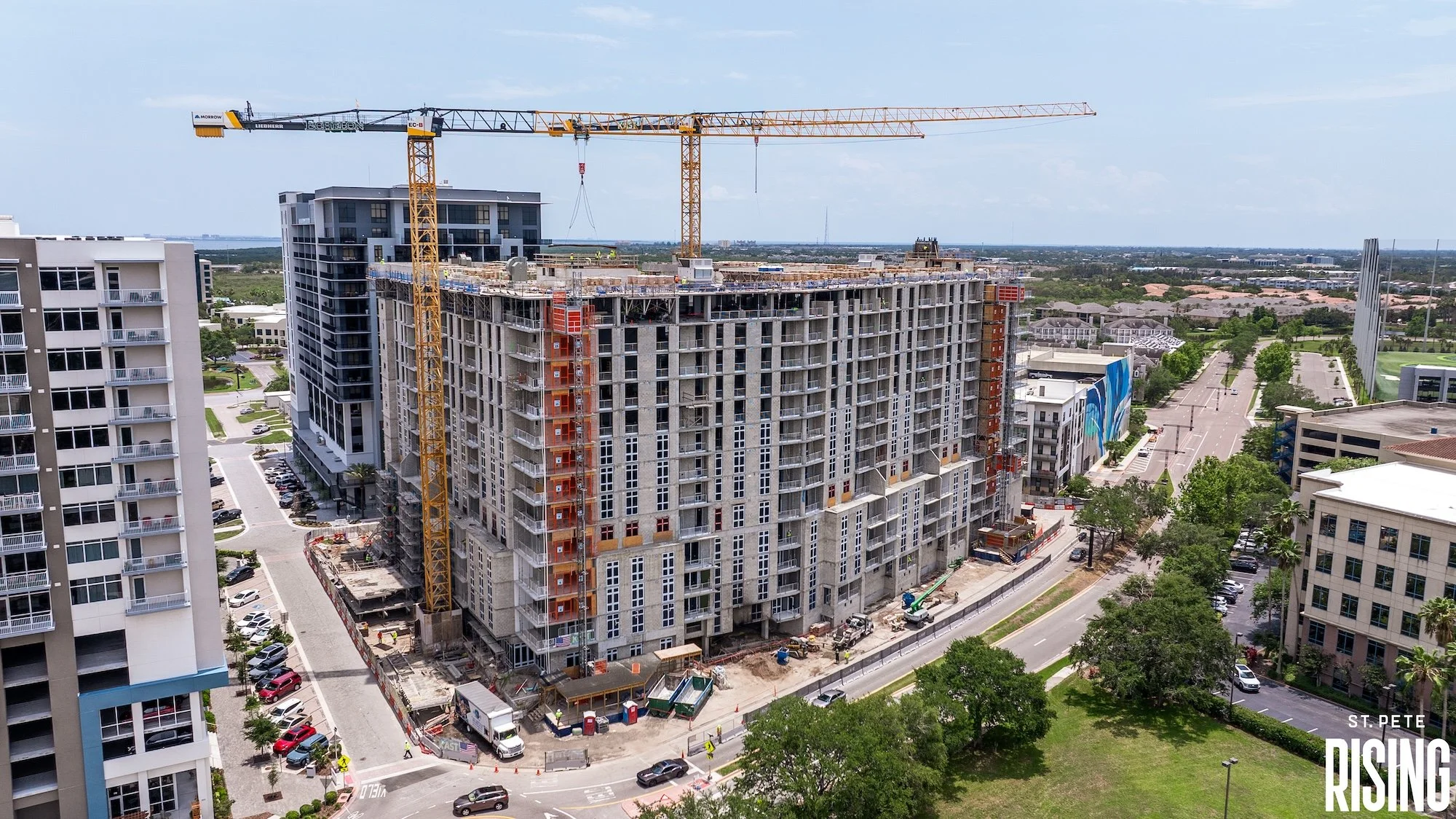 14-story luxury apartment tower tops out at Echelon City Center in ...