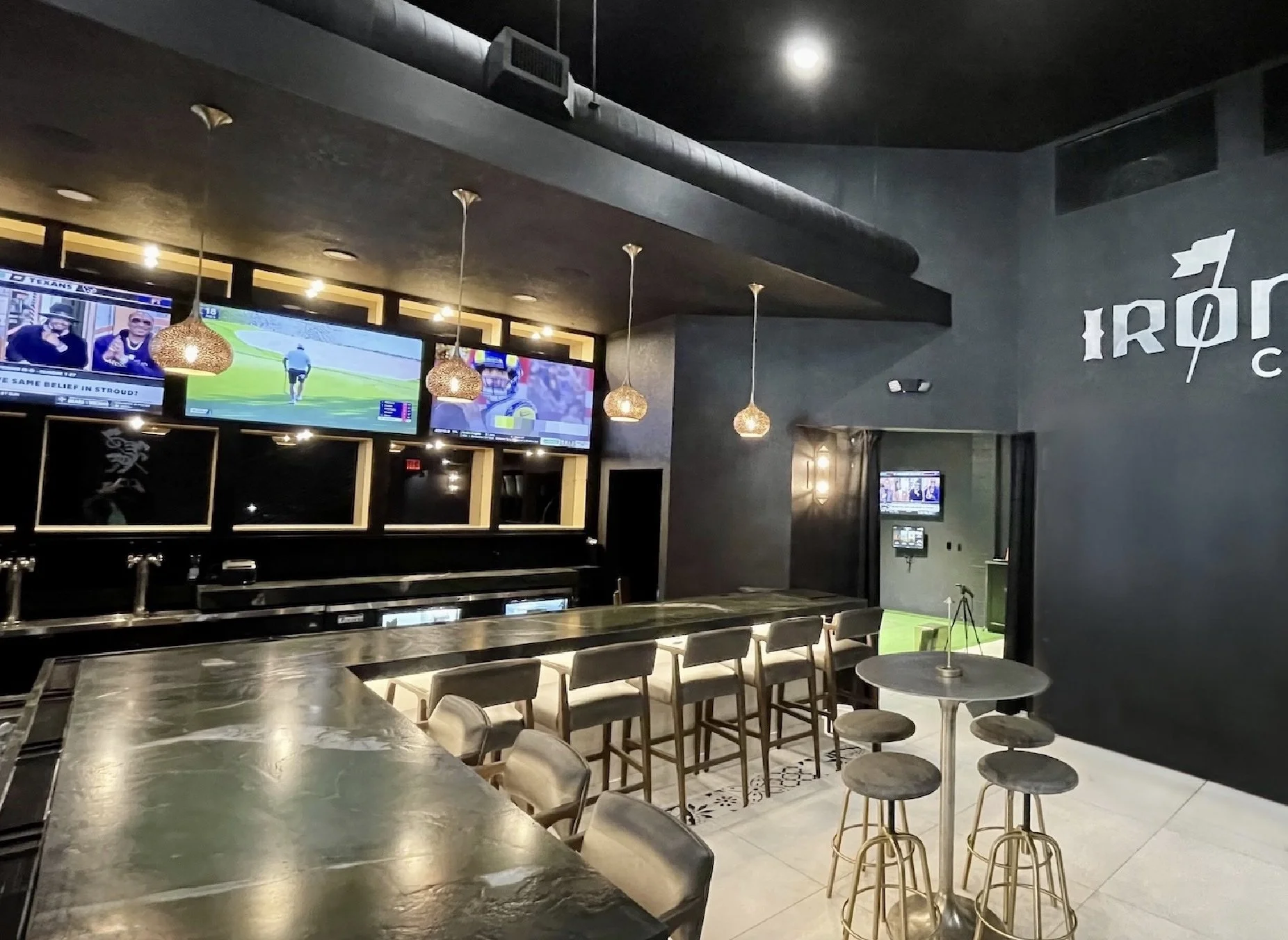 Indoor golf lounge The Irons Club swings into downtown St. Pete