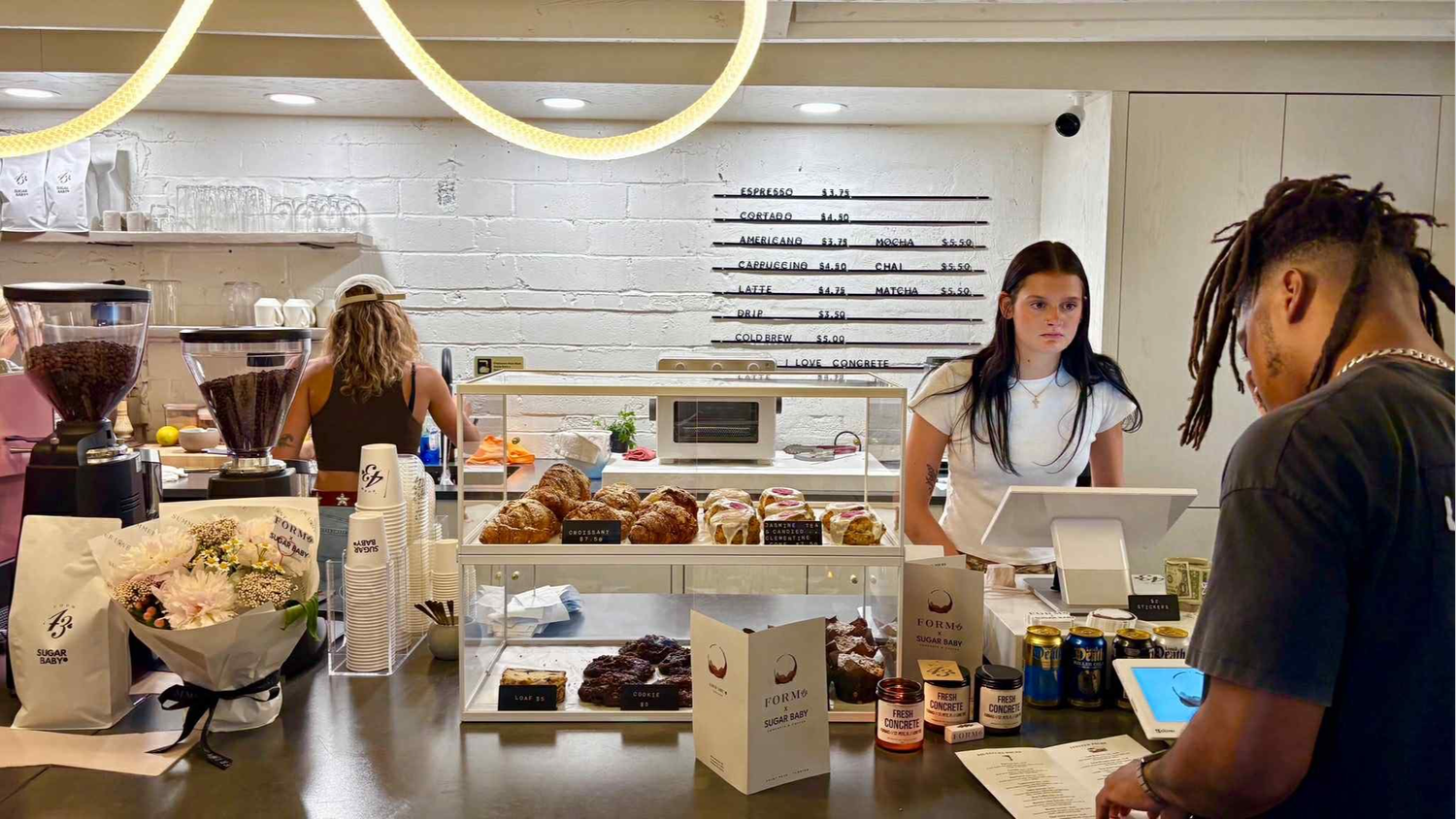 Local coffee shop Sugar Baby quietly opens inside concrete design ...