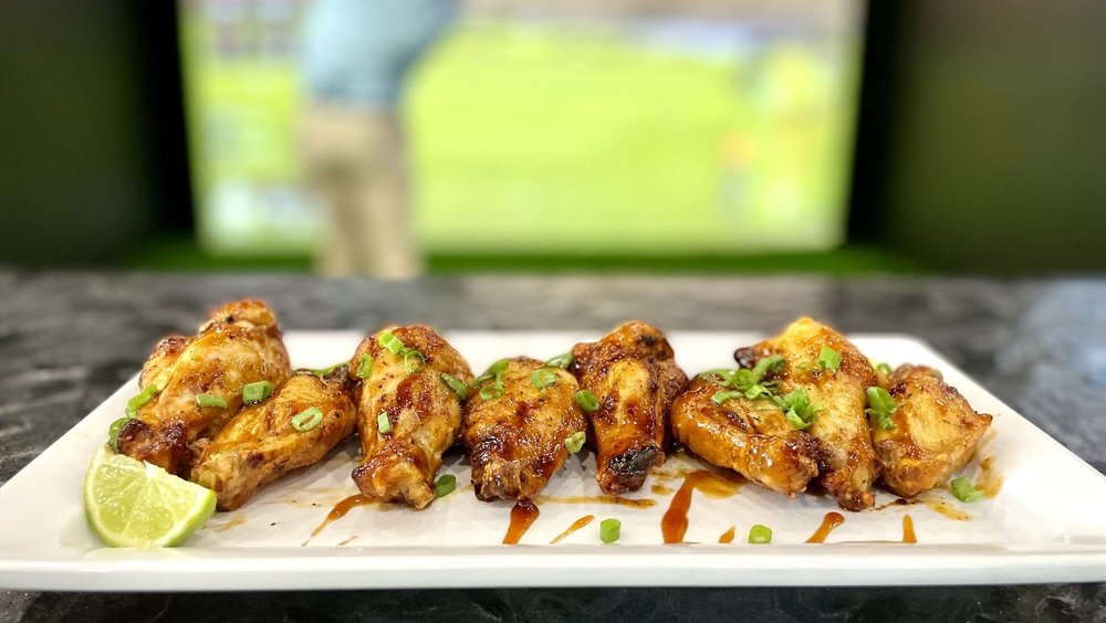 Indoor golf lounge The Irons Club swings into downtown St. Pete