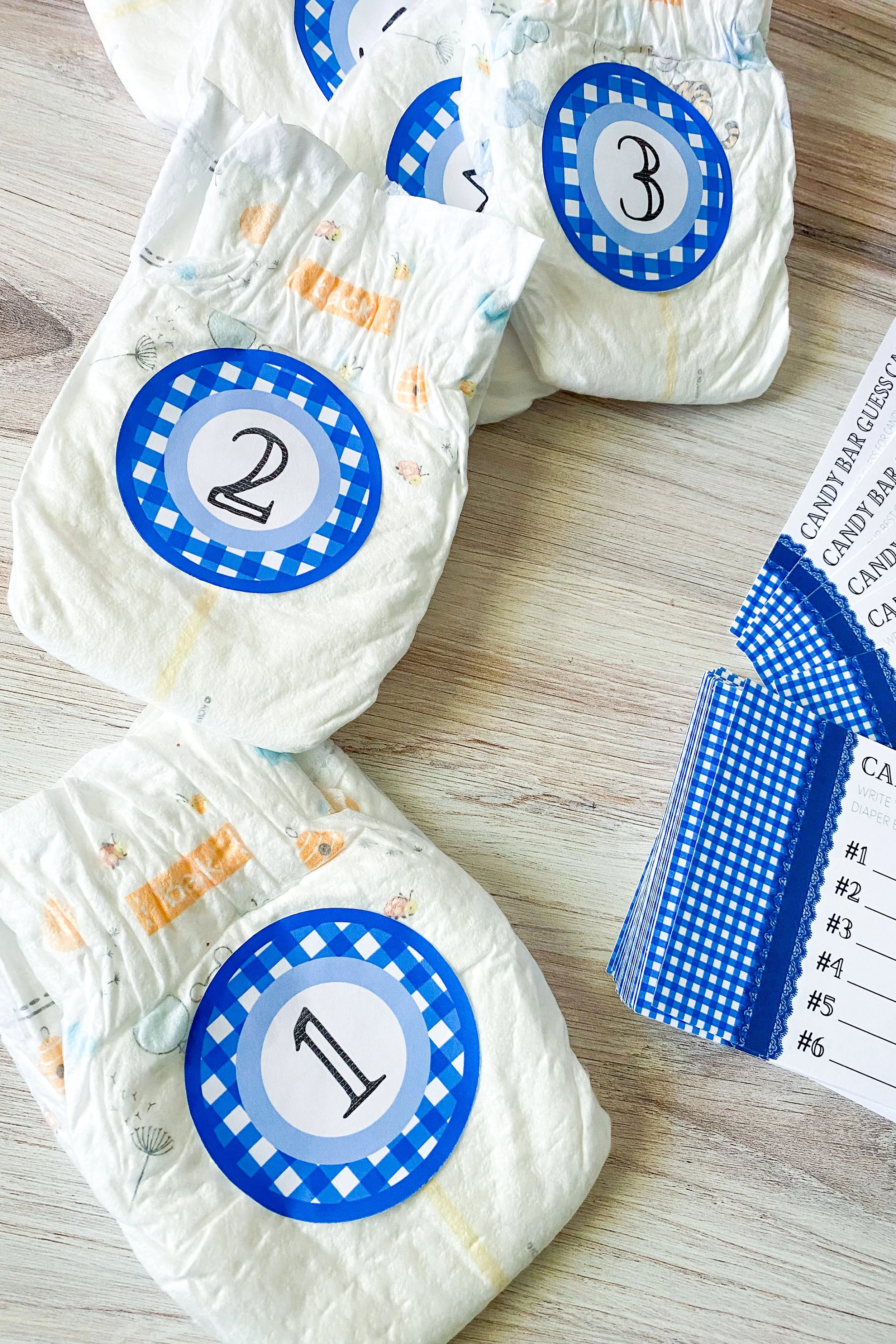Guess the Melted Candy Bar Loaded Diapers Baby Shower Game — Wine ...
