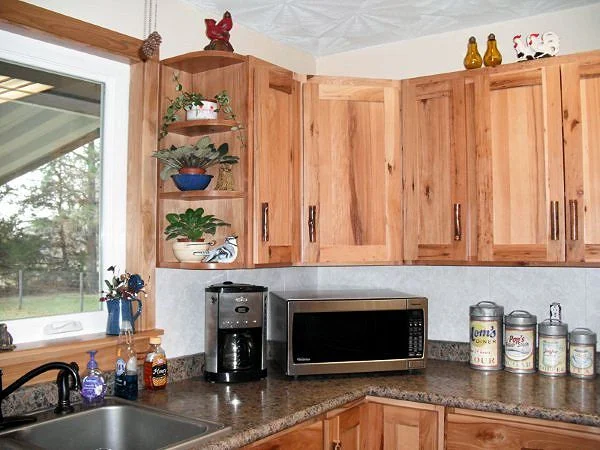 A Rustic Hickory Kitchen with Pictures of Cabinets