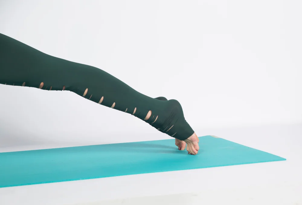 Learn How to Roll Over Your Toes from Upward Facing Dog to Downward ...