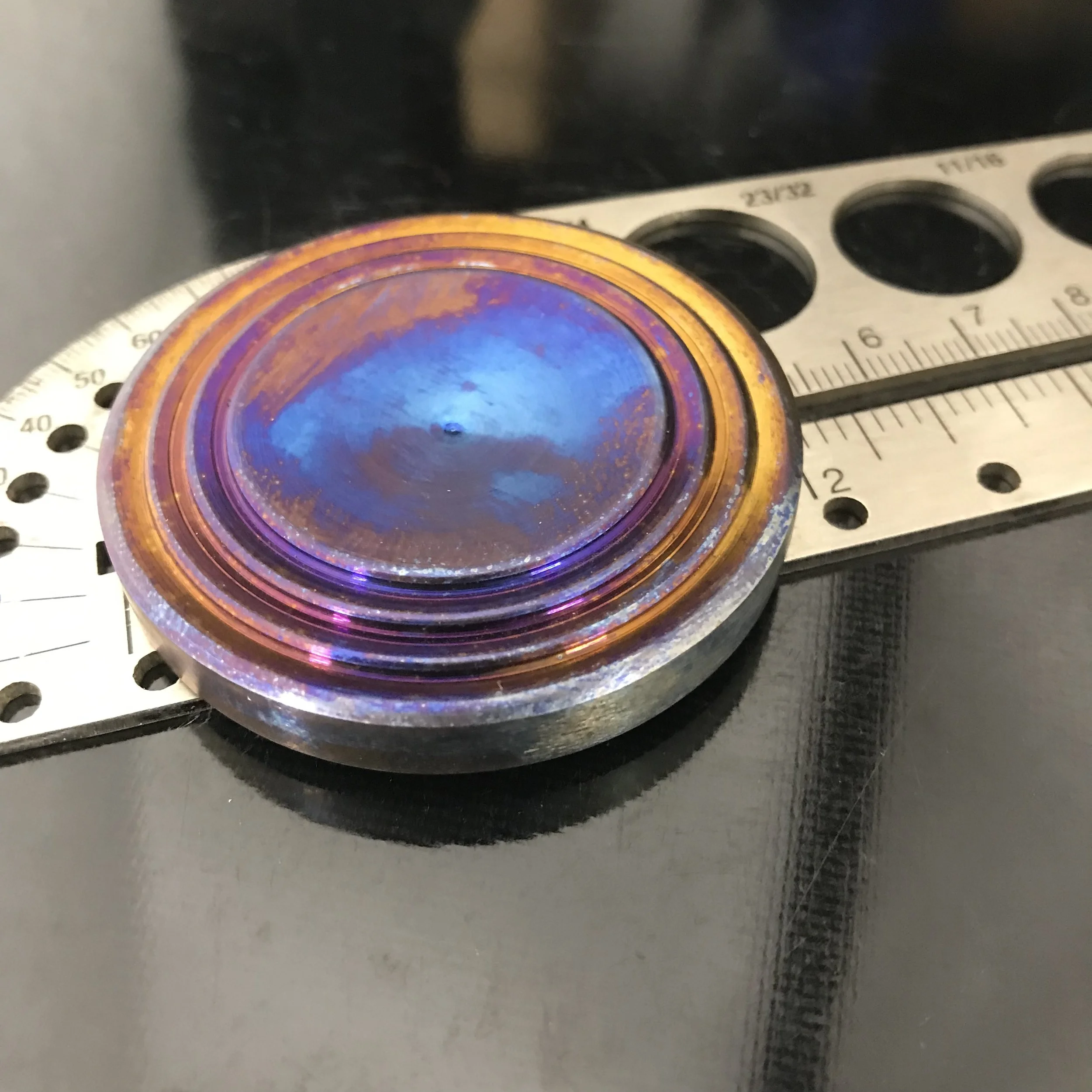 2" Double Dished Titanium Worry Coin with Heat Patina — OberMetalWorks