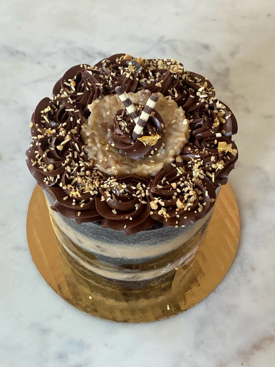 Signature Cake Designs — Triple Crown Bakery