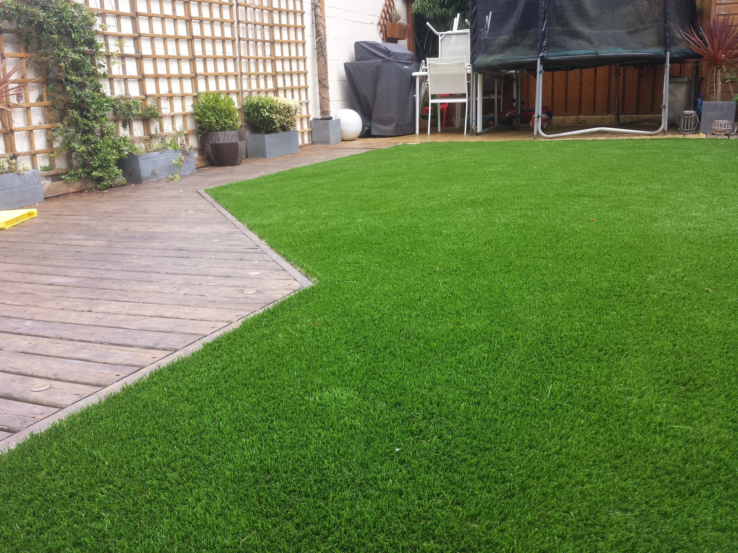 Garden Deck and Grass — Amazon Landscaping and Garden Design-