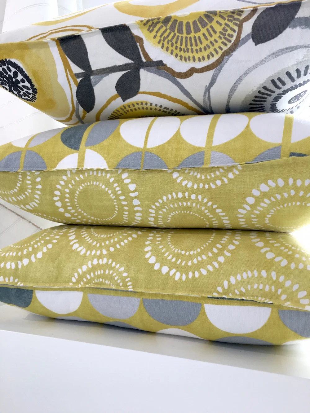 HOT DECOR IDEA: TWO-TONE SCATTER CUSHIONS — Stuart Graham Fabrics