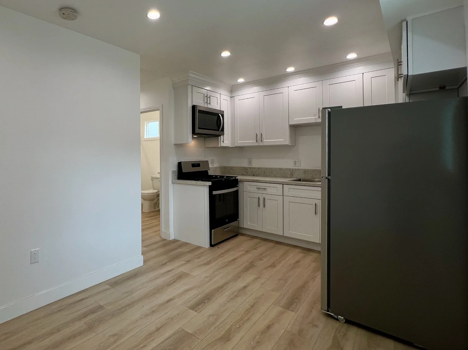 1325 1/4 N Normandie Ave — The Mason Canter Group