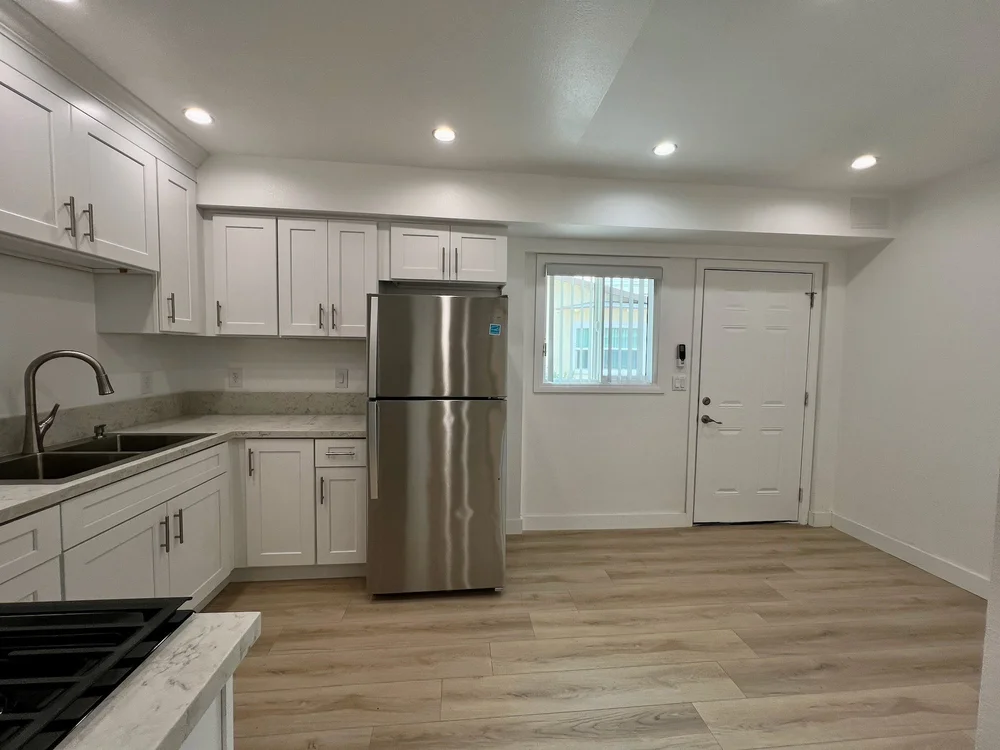 1325 1/4 N Normandie Ave — The Mason Canter Group