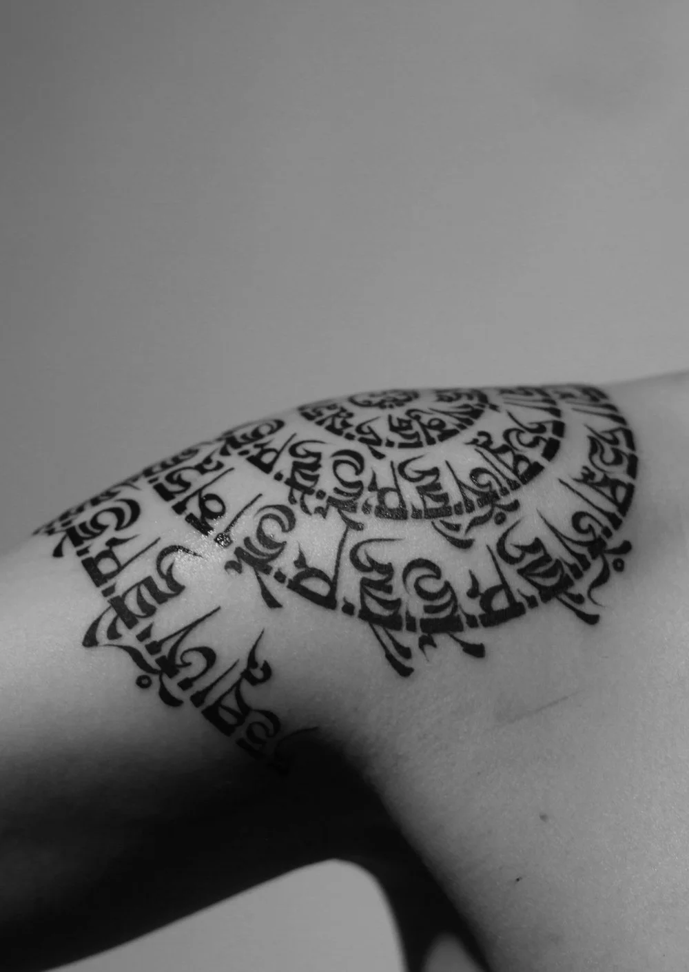 Buddhist Mantra Tattoo