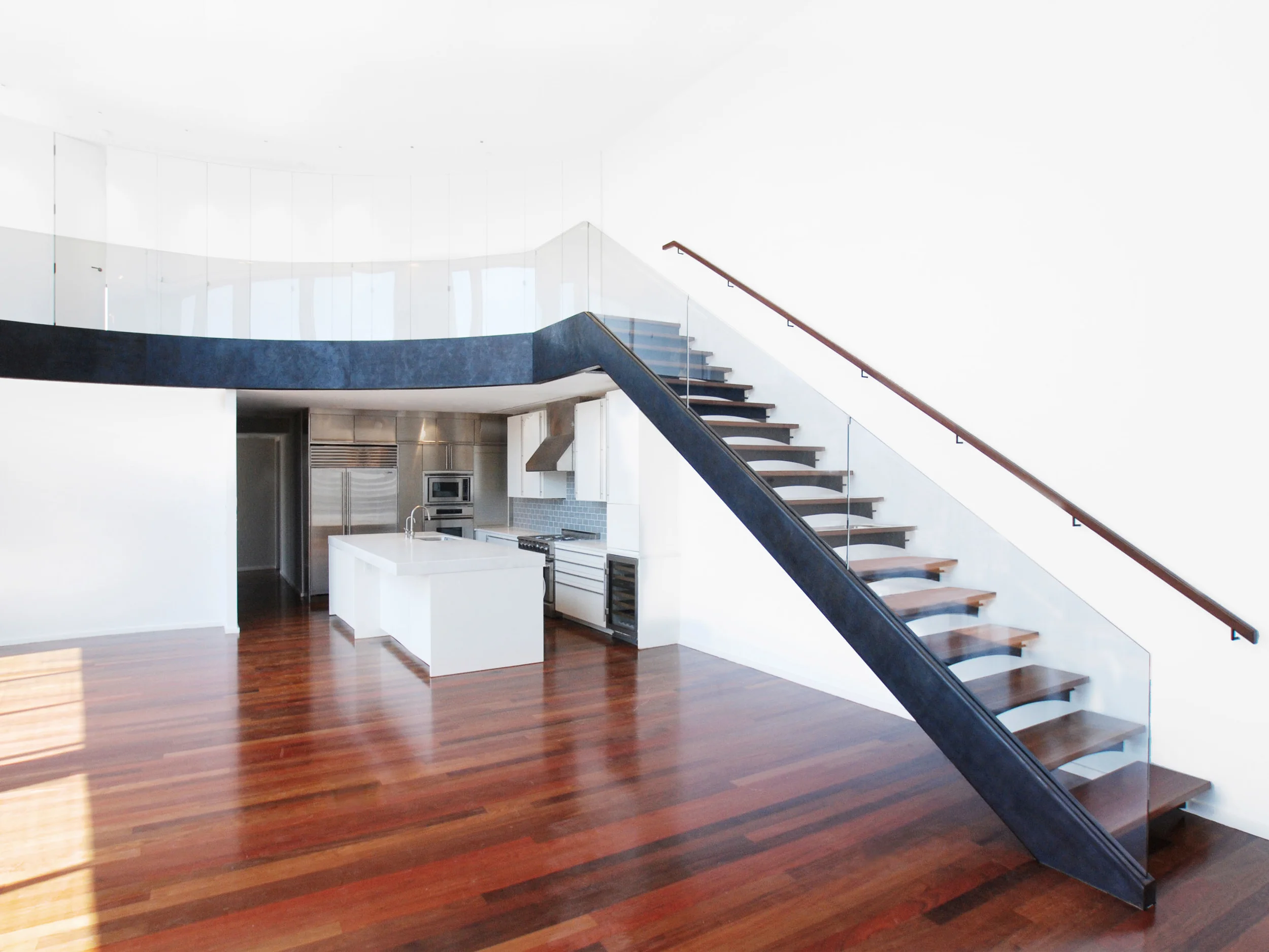 Blacked Steel Staircase with Mezzanine — Custom Metal Fabrication in ...
