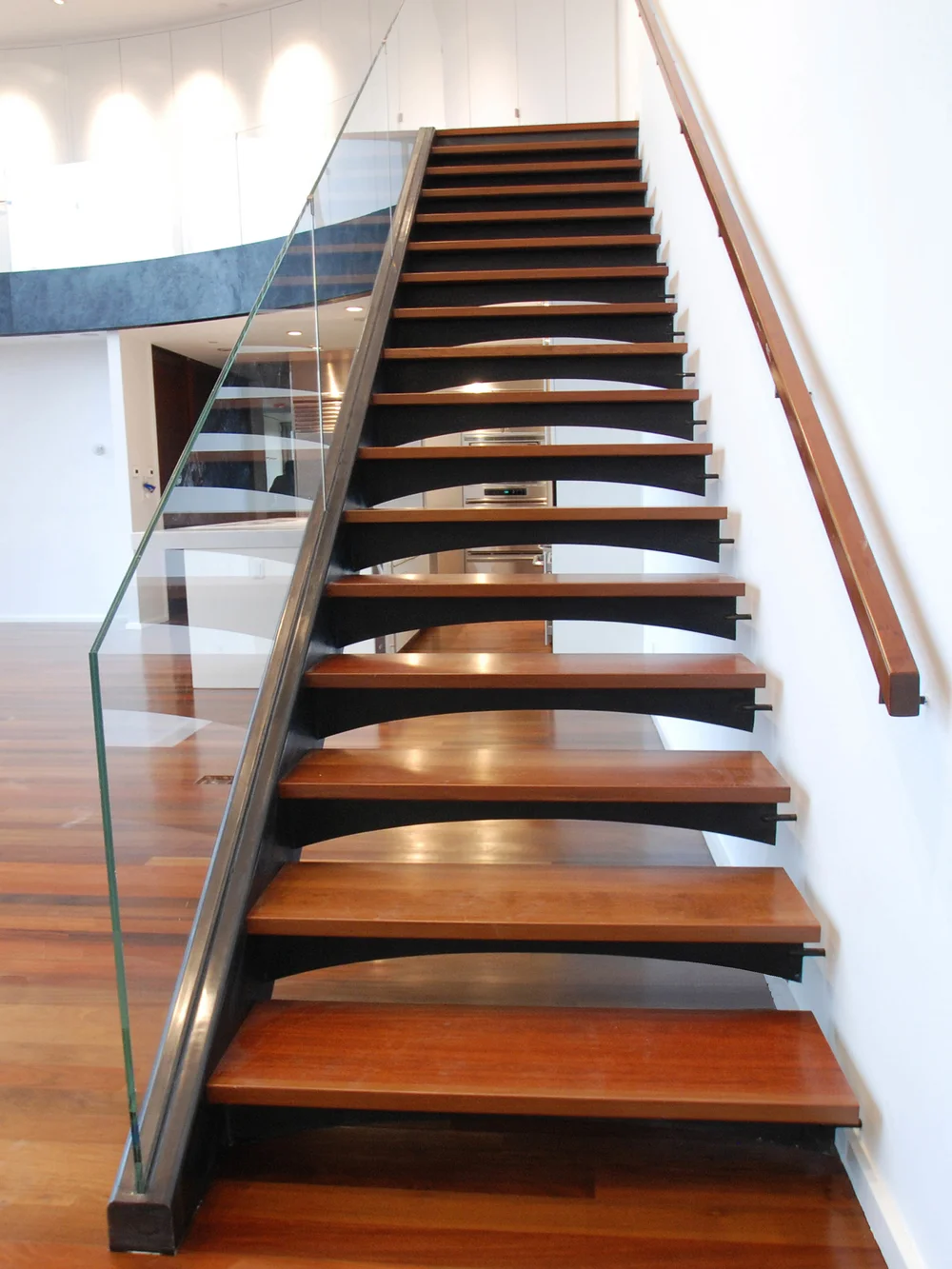Blacked Steel Staircase with Mezzanine — Custom Metal Fabrication in ...
