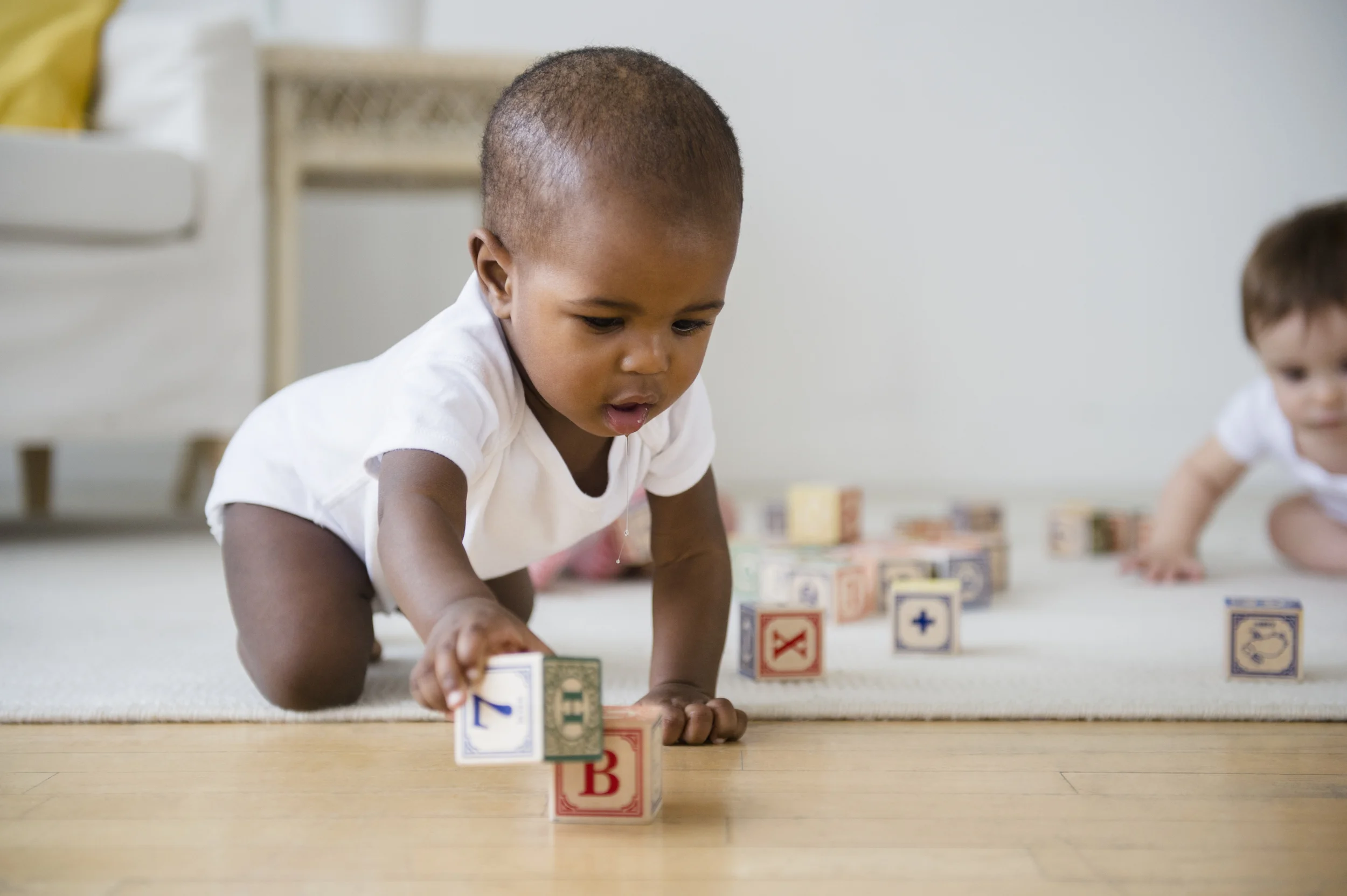 Babies Playing With Blocks