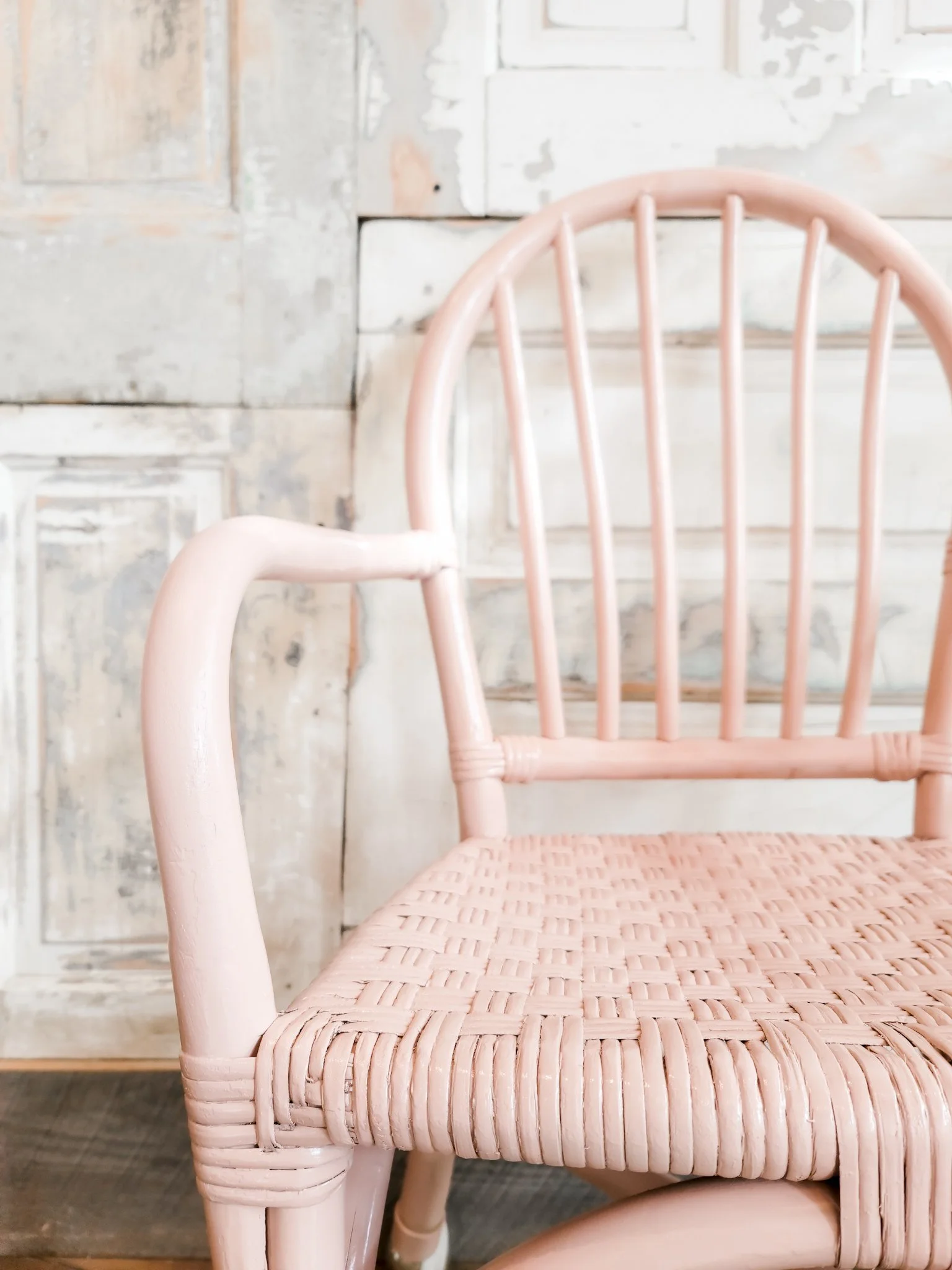 PINK WICKER CHAIR $35 — Chippy White Table